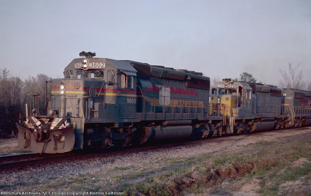 Seaboard System SD40-2 #3602, with an SD40 and SD40-2 trailing, lead a Florida Power & Light ...